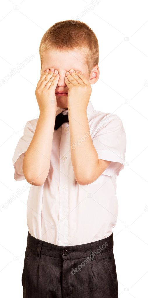 Crying boy covers his face with hands isolated on white. Stock Photo by ...