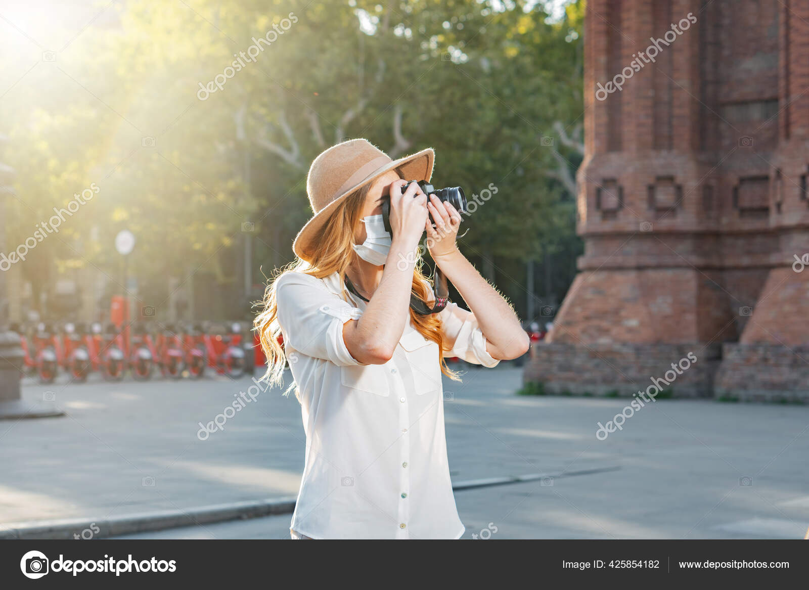 Female Professional Photographer Wearing Face Mask Taking Pictures ...