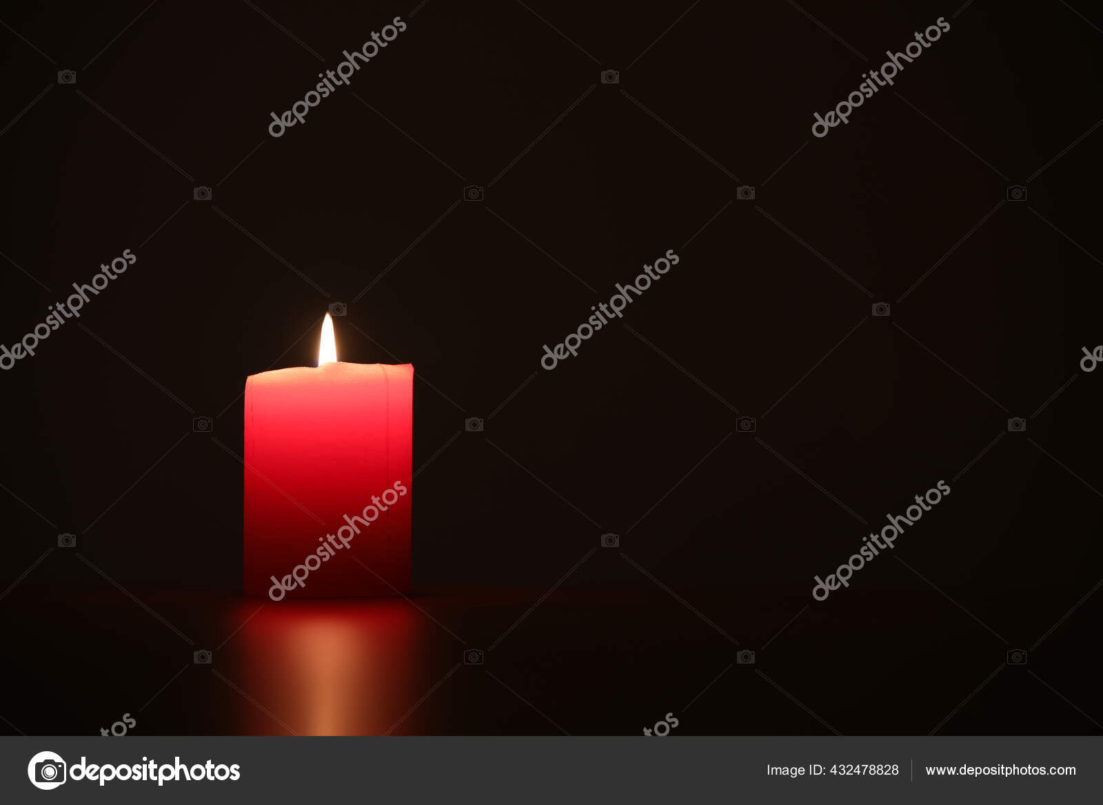 Closeup Shot Brightly Glowing Candle Light Reflection Table Surface ...