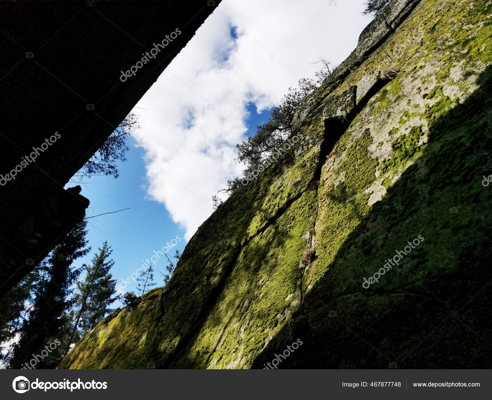 Closeup Shot Rock Cliffs Covered Green Moss Blue Sky Background — Stock ...