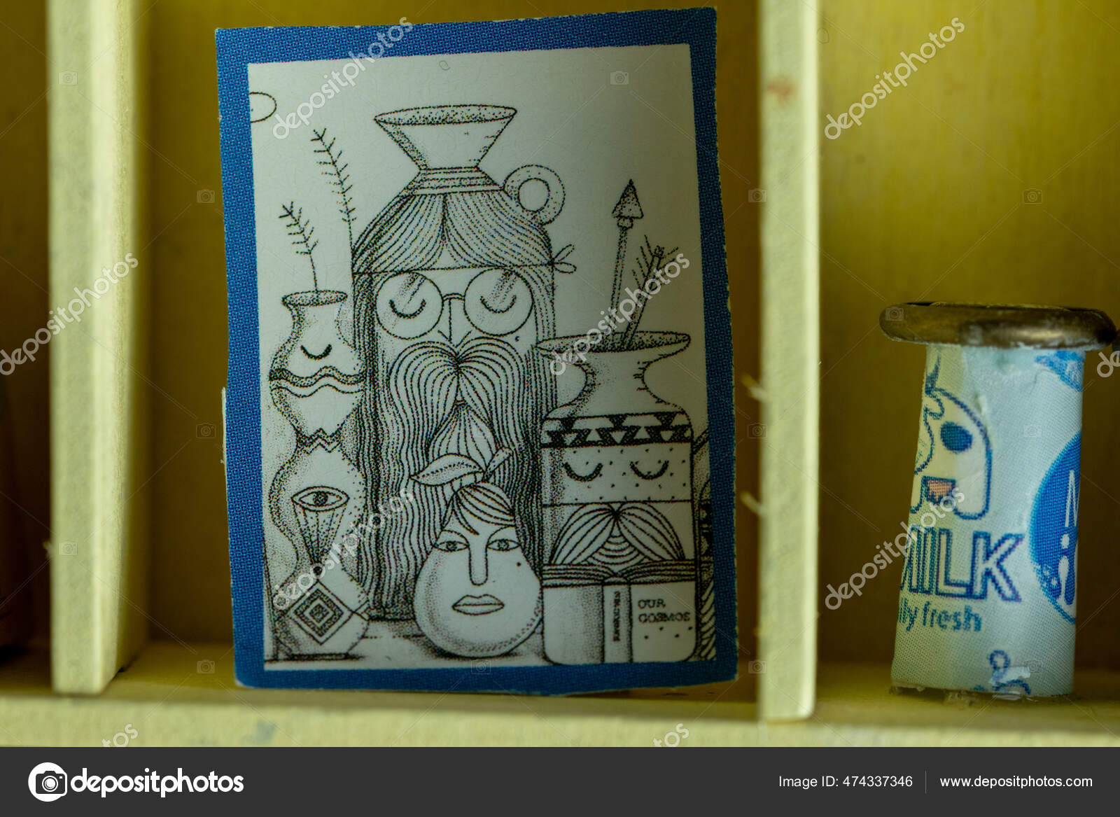 Closeup View Surrealistic Drawing Objects Human Faces Placed Bookshelf ...
