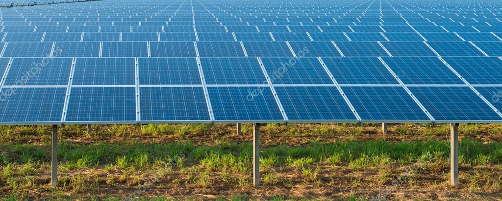 Solar cell panels in a photovoltaic power plant — Stock Photo © tumeyes ...