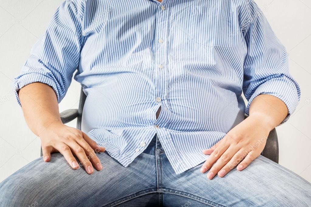 Fat man sitting on chair Stock Photo by ©wittybear 77991880