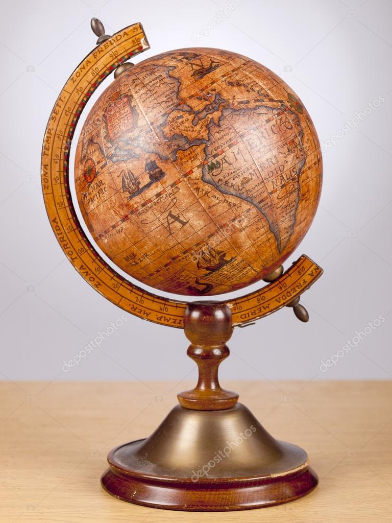 An old brown vintage globe on a small stand Stock Photo by ©wtolenaars ...