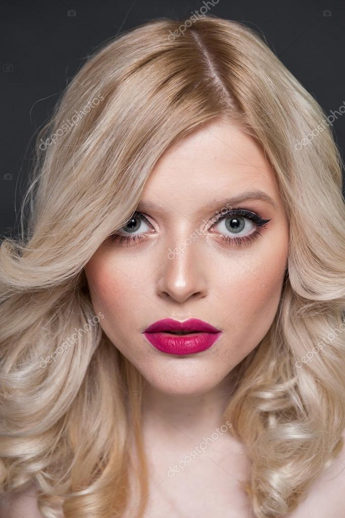 Unretouched studio beauty portrait of a blonde girl Stock Photo by ...