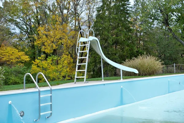 Swimming pool slide Stock Photos, Royalty Free Swimming pool slide ...