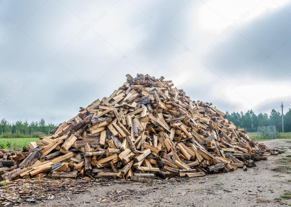 A large pile of split firewood. — Stock Photo © svn48 #53341511