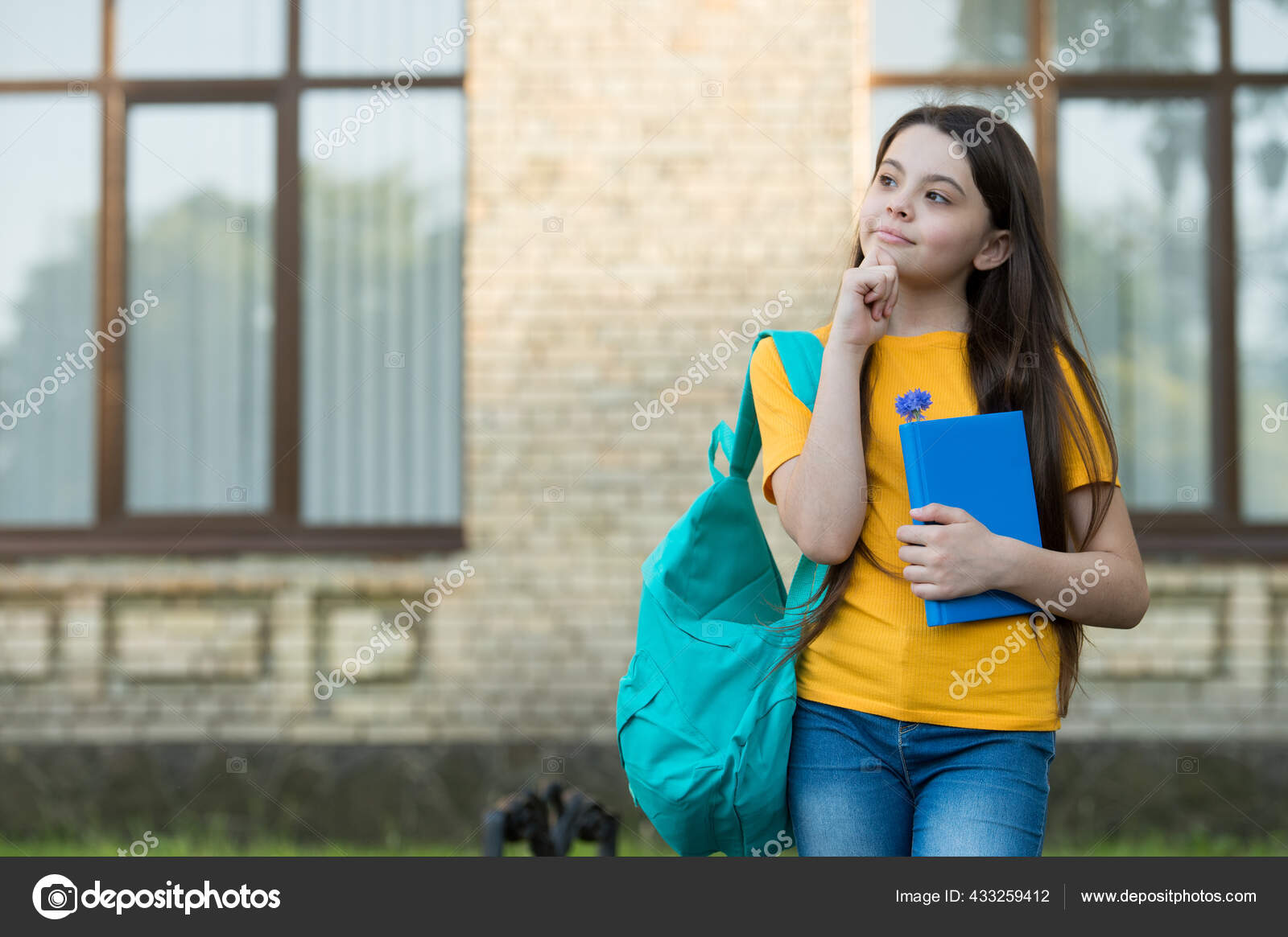 Imagination is more important than knowledge. Serious child hold book ...