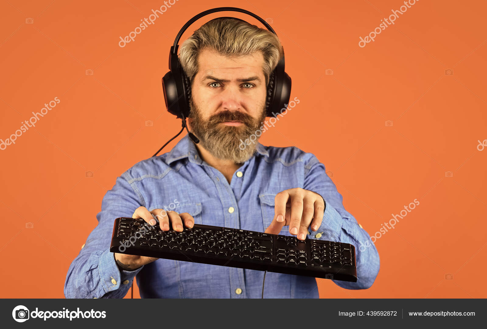 Programmer typing on keyboard. Digital Music Creation. man listen ...