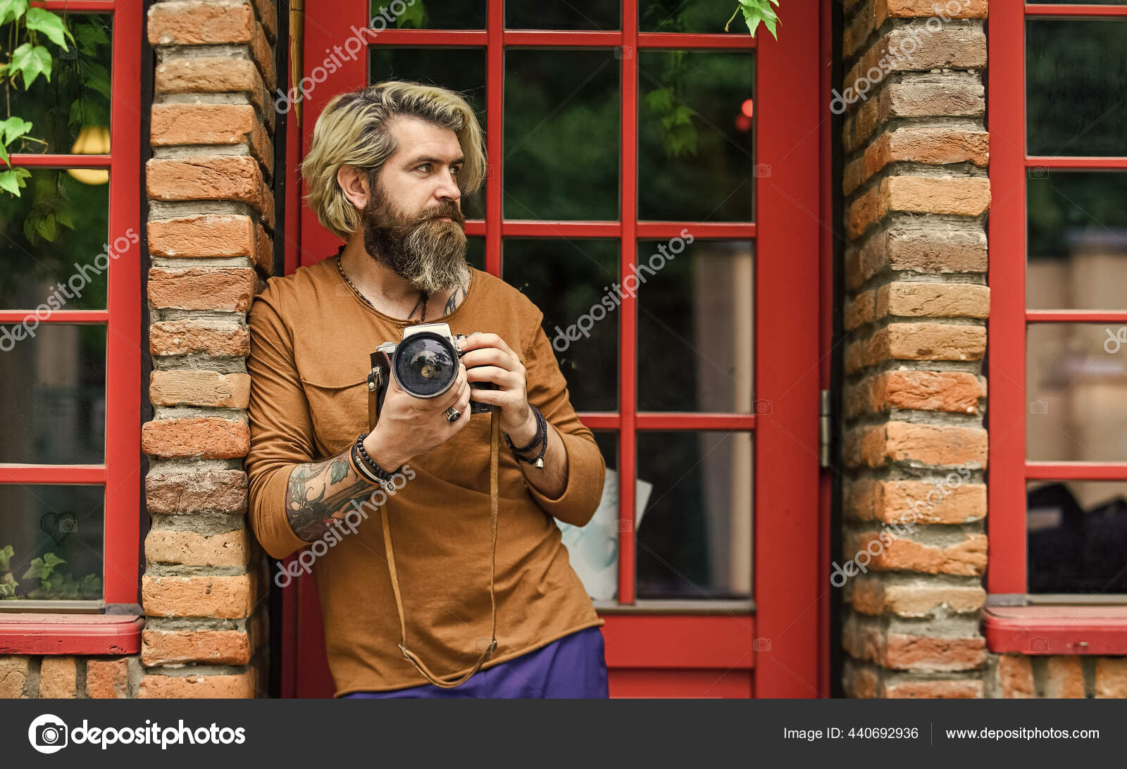 Will you pose for me. photographer hold retro camera. journalist is my ...
