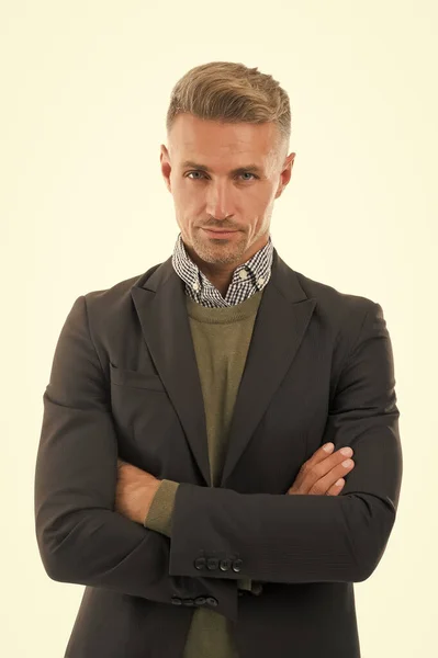 Dressing to send confident impression. Confident man keep arms crossed ...