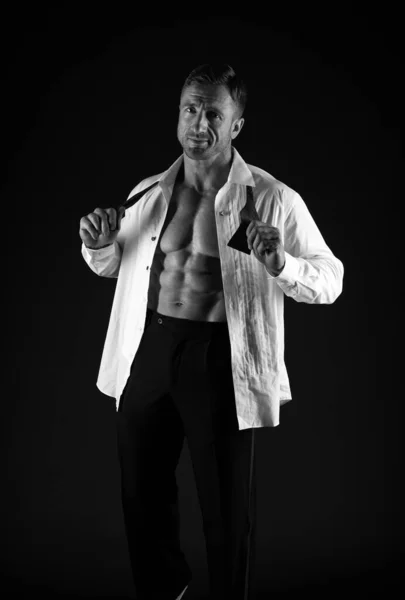 Be inspiration. Bodybuilder or muscleman black background. Elegant ...