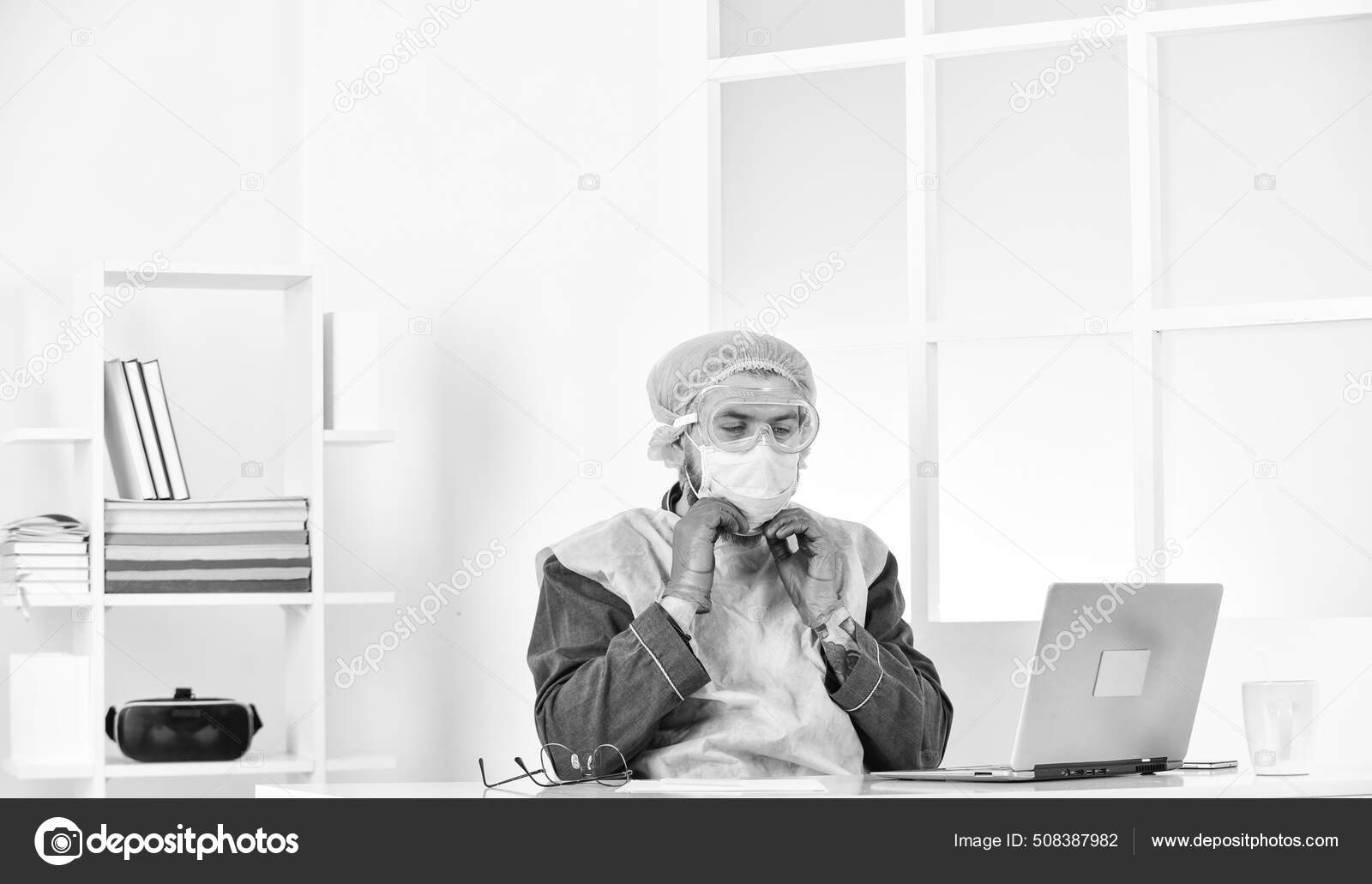 Remote work concept. man in sanitary doctor uniform. man wear ...
