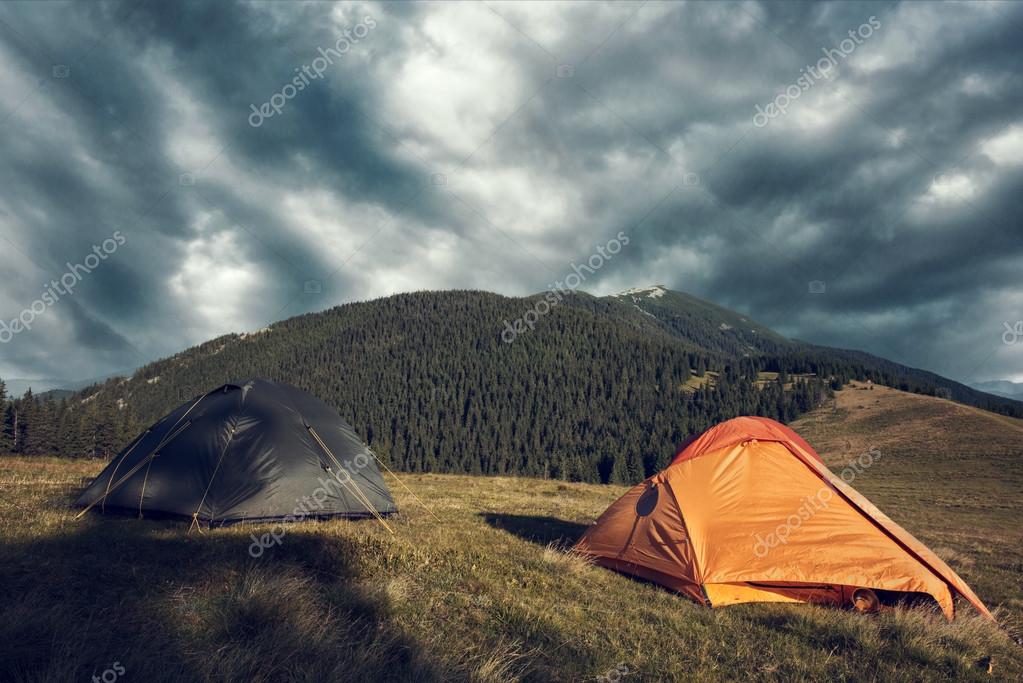 Tents in mountains during storm — Stock Photo © olegkrugllyak #80599752