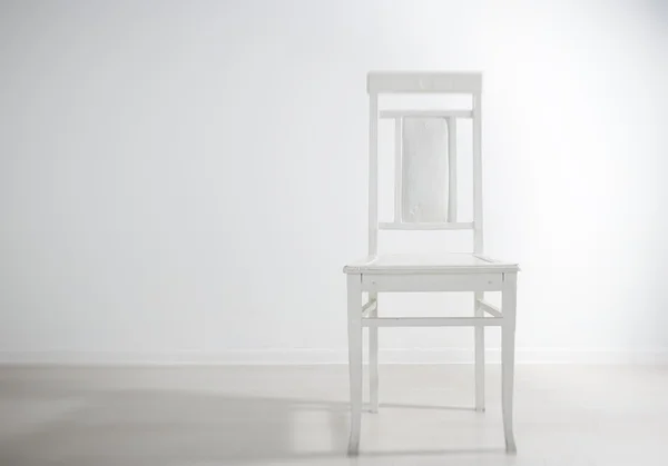 White chair Stock Photos, Royalty Free White chair Images | Depositphotos