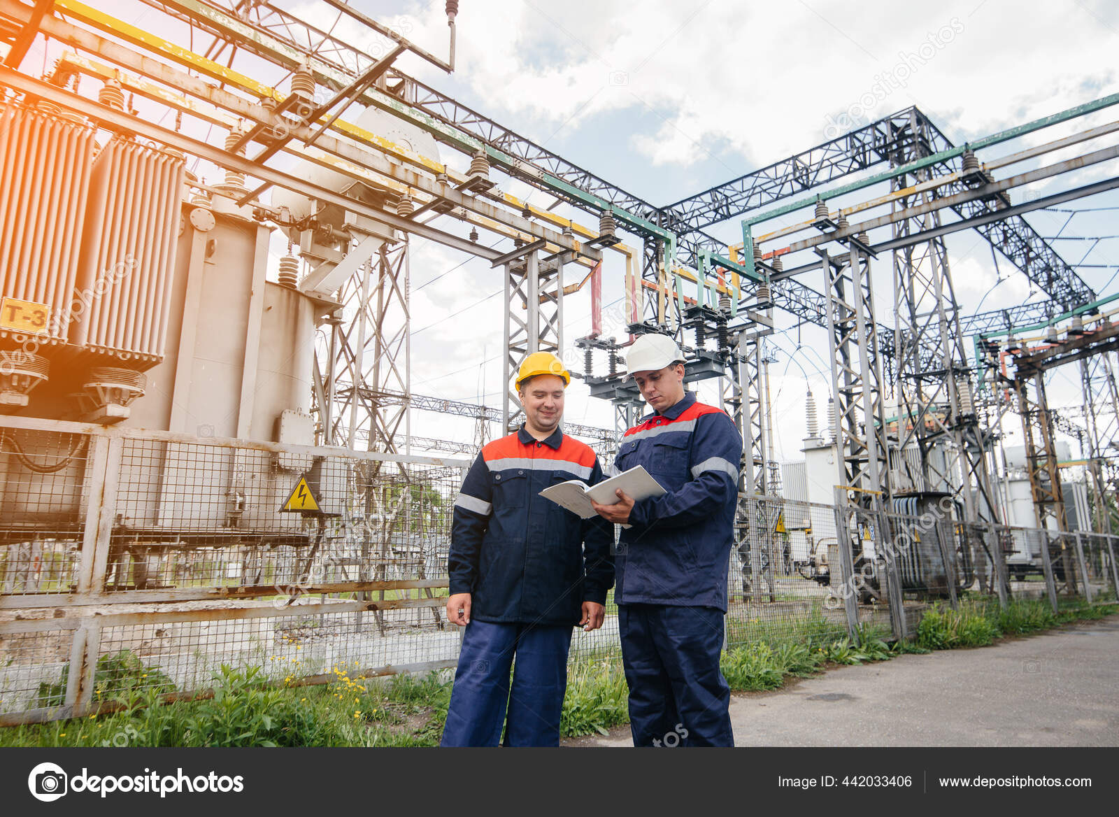 Two Specialist Electrical Substation Engineers Inspect Modern High ...