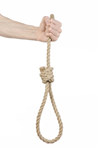 Lynching and suicide theme: man's hand holding a loop of rope for ...