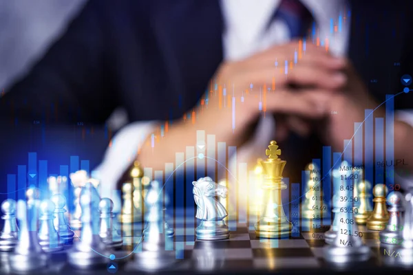 financial and stock market economic planning concept, king chess with ...