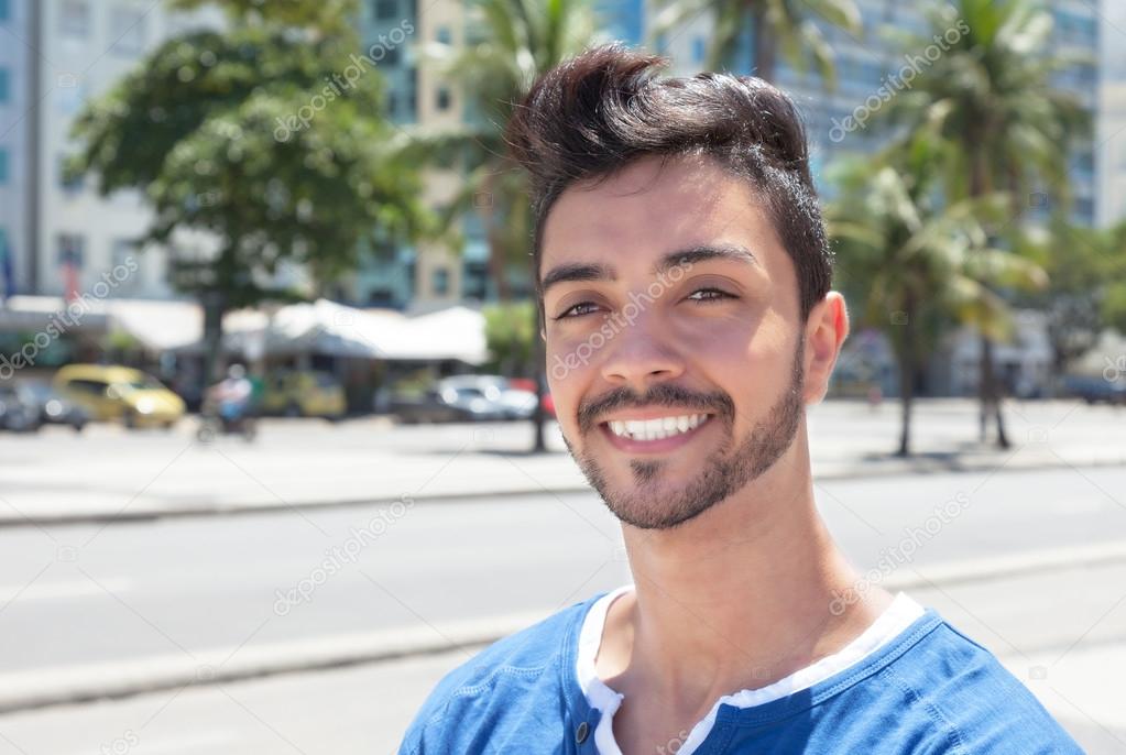 Dreaming brazilian guy in a modern city — Stock Photo © kadettmann ...