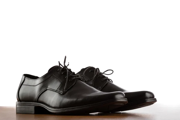 Shoes on black background Stock Photos, Royalty Free Shoes on black ...