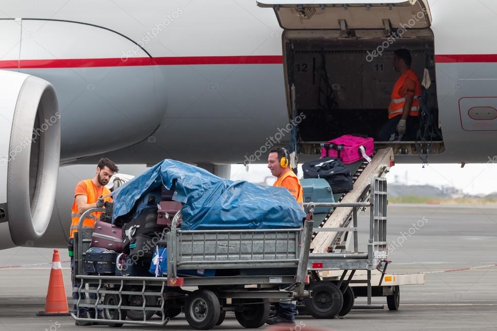 People Loading Luggage On The Plane To The Airport Macedonia A R Stock Editorial Photo