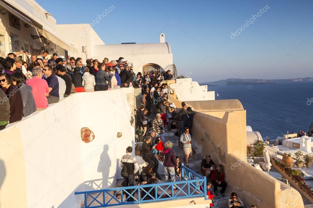 Oia, Santorini, Greece- May 13, 2015: A crowd awaits tourists th ...
