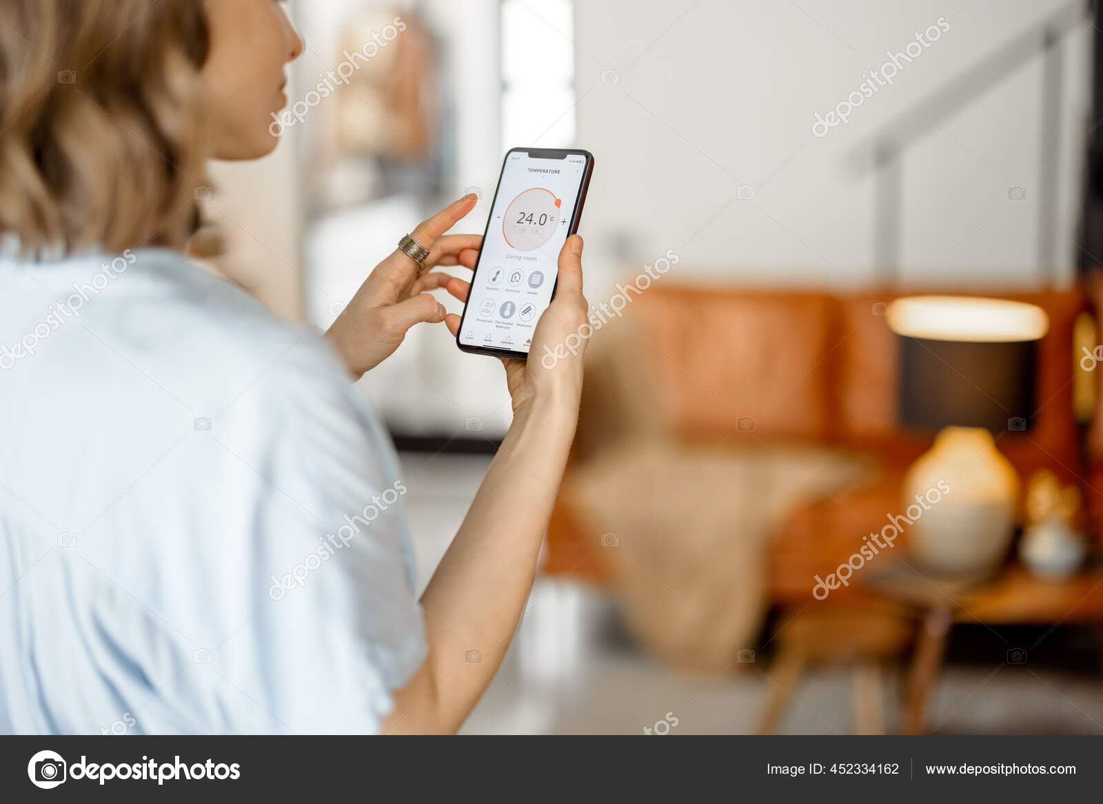 Smartphone with launched application for temperature adjustment Stock ...