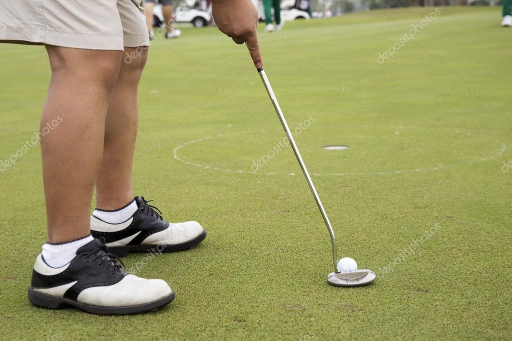 Close up Golf player putting ball — Stock Photo © kung_mangkorn #76693349