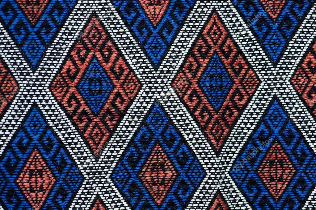 Colorful thai silk handcraft peruvian style rug surface close up More ...