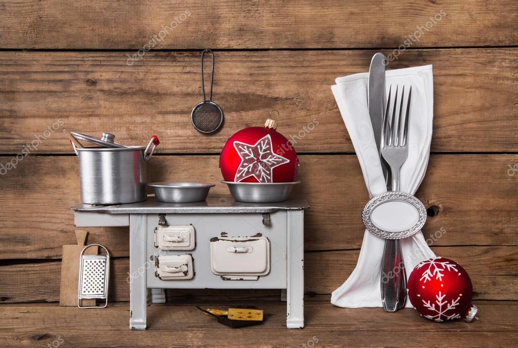 Preparing christmas dinner. Wooden background with cutlery and o Stock ...