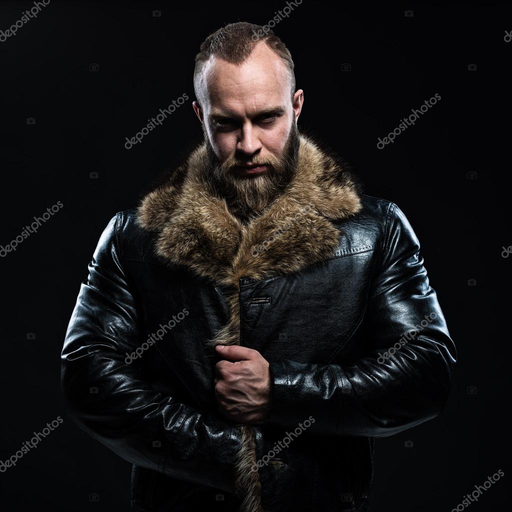 Brutal handsome glum unshaven man with beard Stock Photo by ©fotoatelie ...