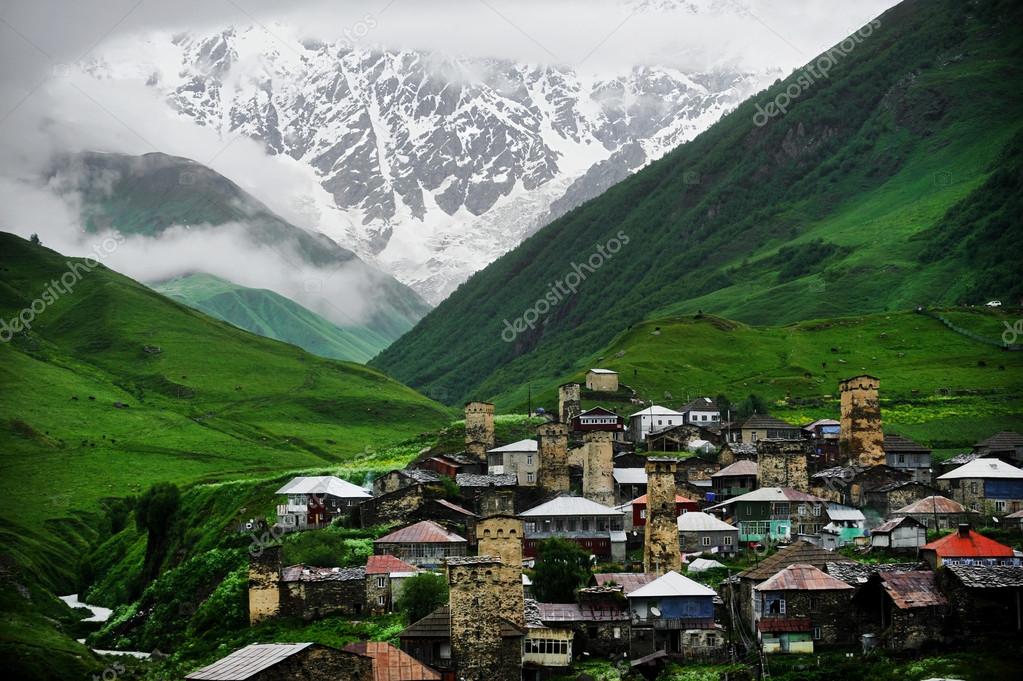 Ushguli village with Shkhara mountain in the background — Stock Photo ...