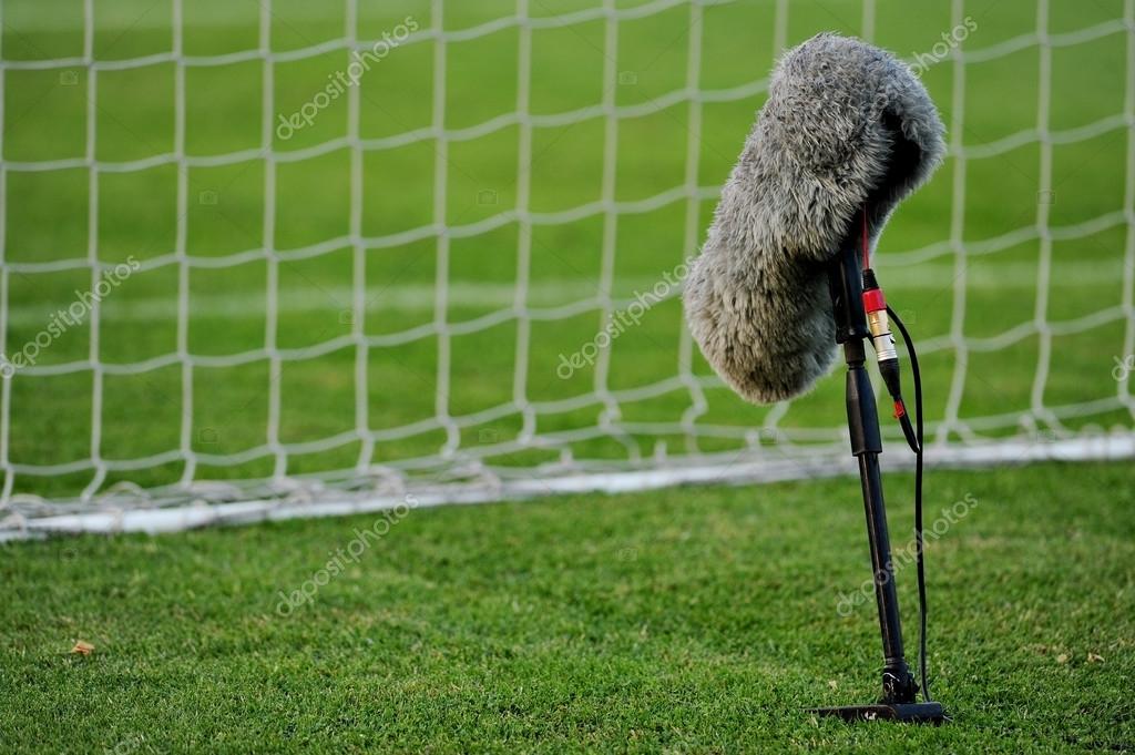 Professional microphone on soccer field — Stock Photo © roibu #84332086
