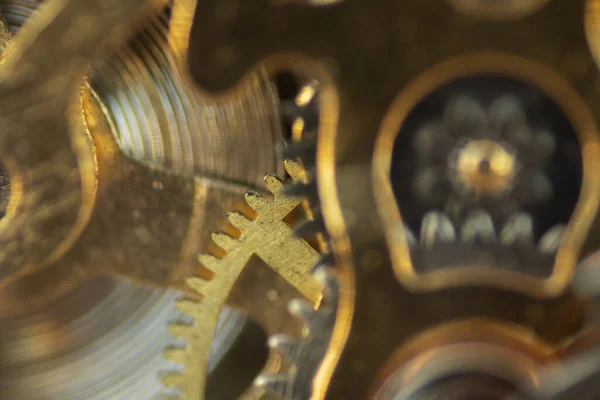 Gold clockworks macro Stock Photos, Royalty Free Gold clockworks macro ...