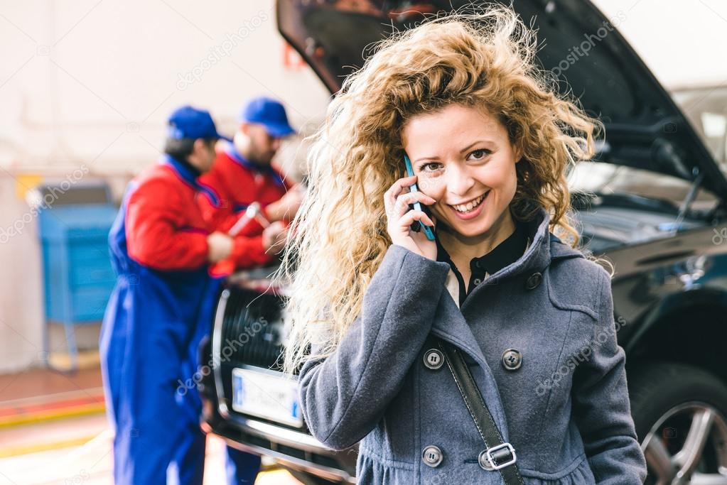 Woman calling car assistance service — Stock Photo © oneinchpunch ...