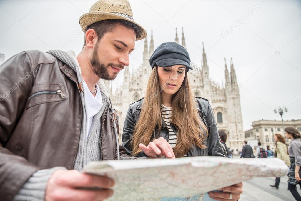 Tourists with city map — Stock Photo © oneinchpunch #63733899