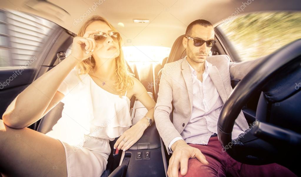 Couple driving fast on a sport car. concept about relationship ...