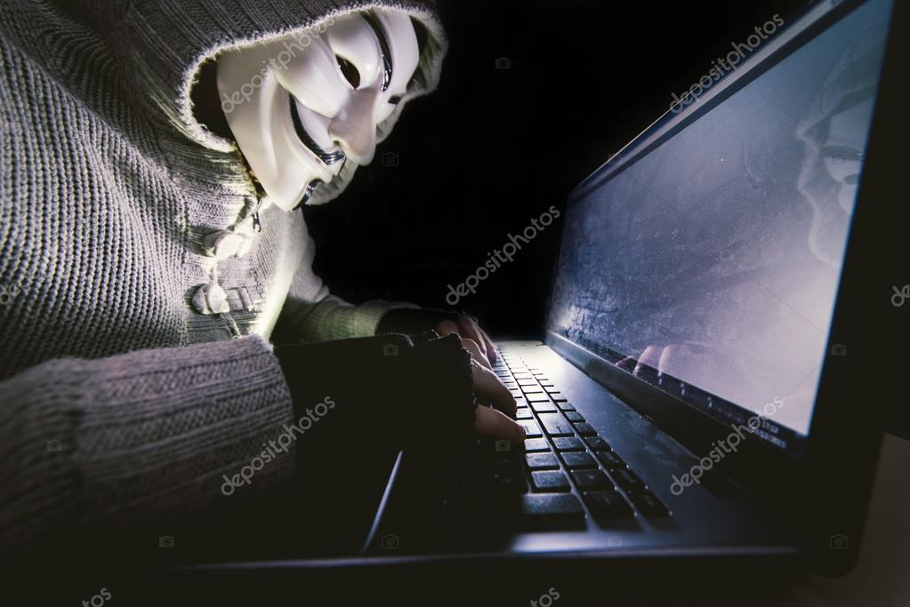 Hacker at work on his computer – Stock Editorial Photo © oneinchpunch ...