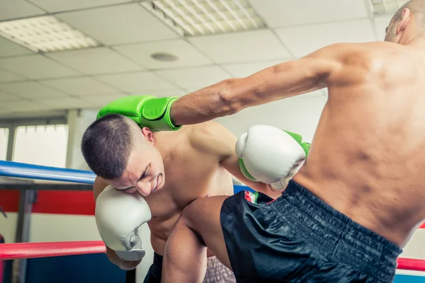 Fighters fighting on the ring — Stock Photo © oneinchpunch #95923746
