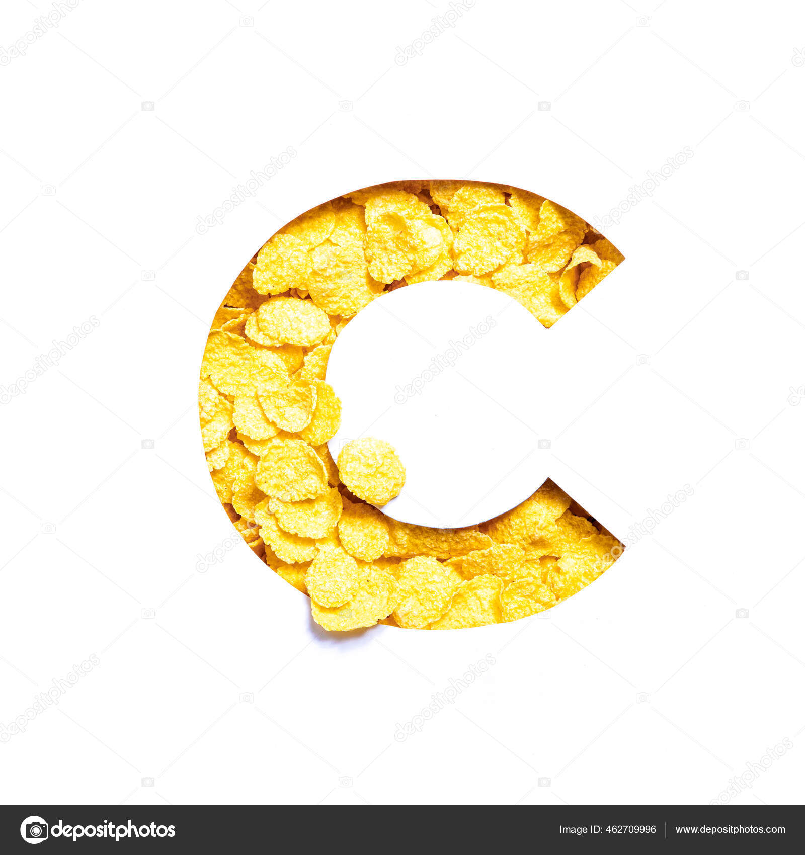 Letter C of alphabet made of bio cereals corn flakes and paper cut ...