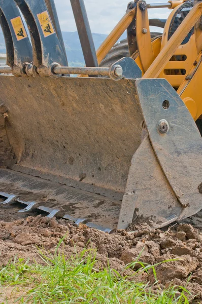 Earthwork with heavy machinery Stock Photo by ©minco.soska 114469424