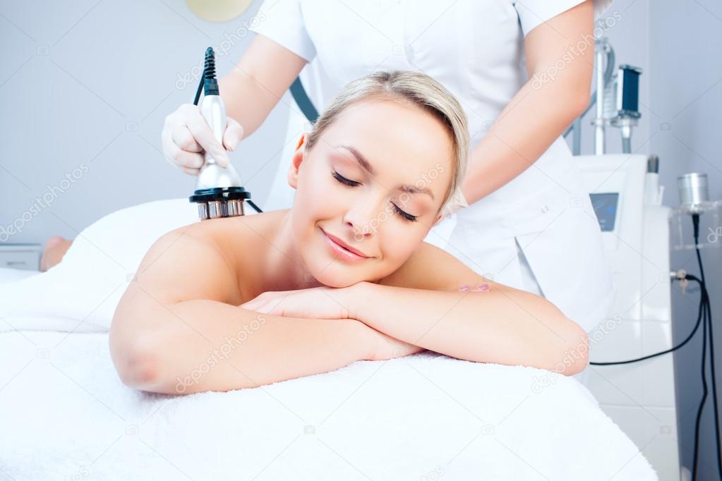 Woman getting rf lifting procedure — Stock Photo © evarlamov #121803136