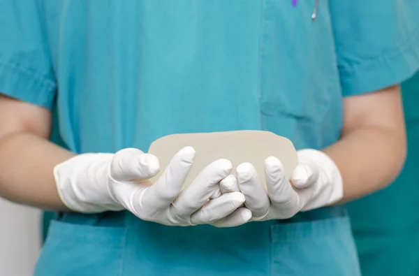 Silicone breast implants Stock Photo by ©BranislavP 80433970