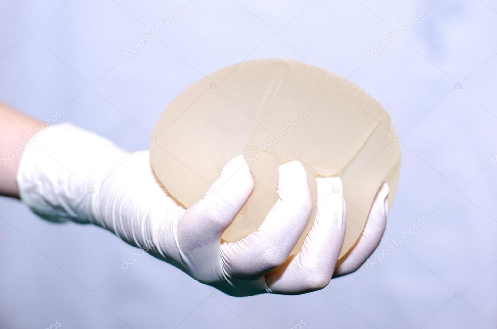 Silicone breast implants Stock Photo by ©BranislavP 80432972
