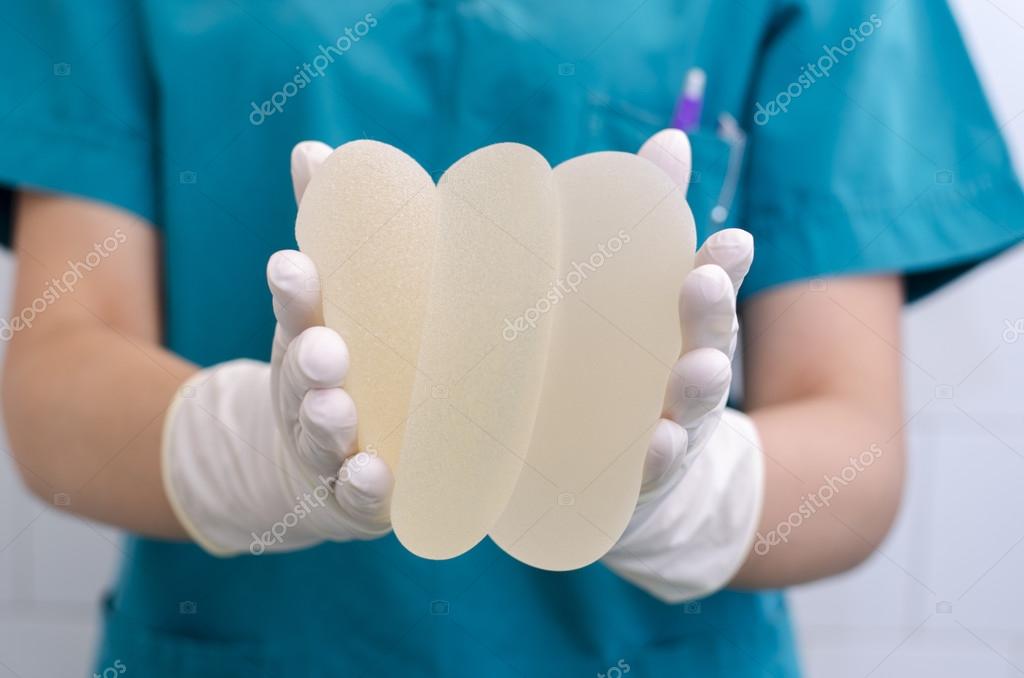 Silicone breast implants Stock Photo by ©BranislavP 80433970