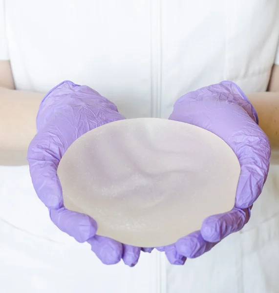 Silicone breast implants Stock Photo by ©BranislavP 80432972
