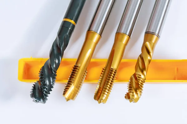 Tap for threading in metal. Tool for metal processing. - Stock Image ...