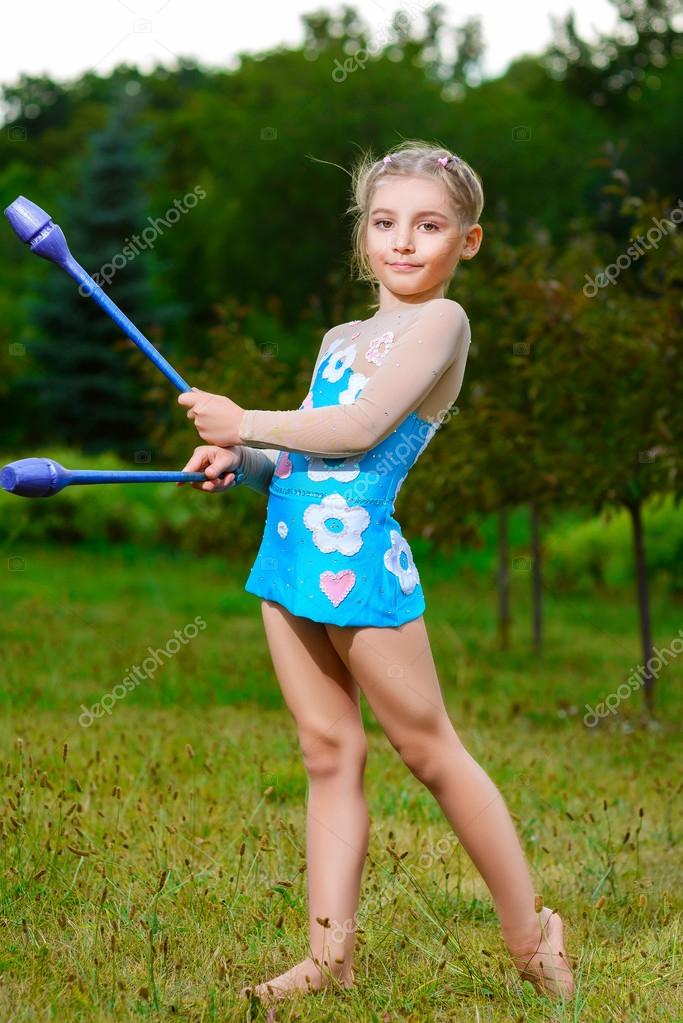 Fitness, sport, people and healthcare concept - little sporty girl ...