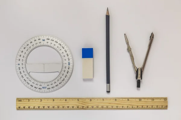 Ruler, compasses, eraser, protractor, pencil and tracing paper r ...