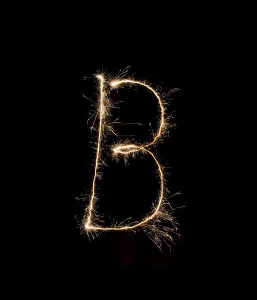 English Letter B from sparklers alphabet on black background. Stock ...